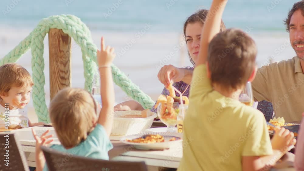 4K SlowMo - family and friends gathered for lunch enjoying a delicious ...