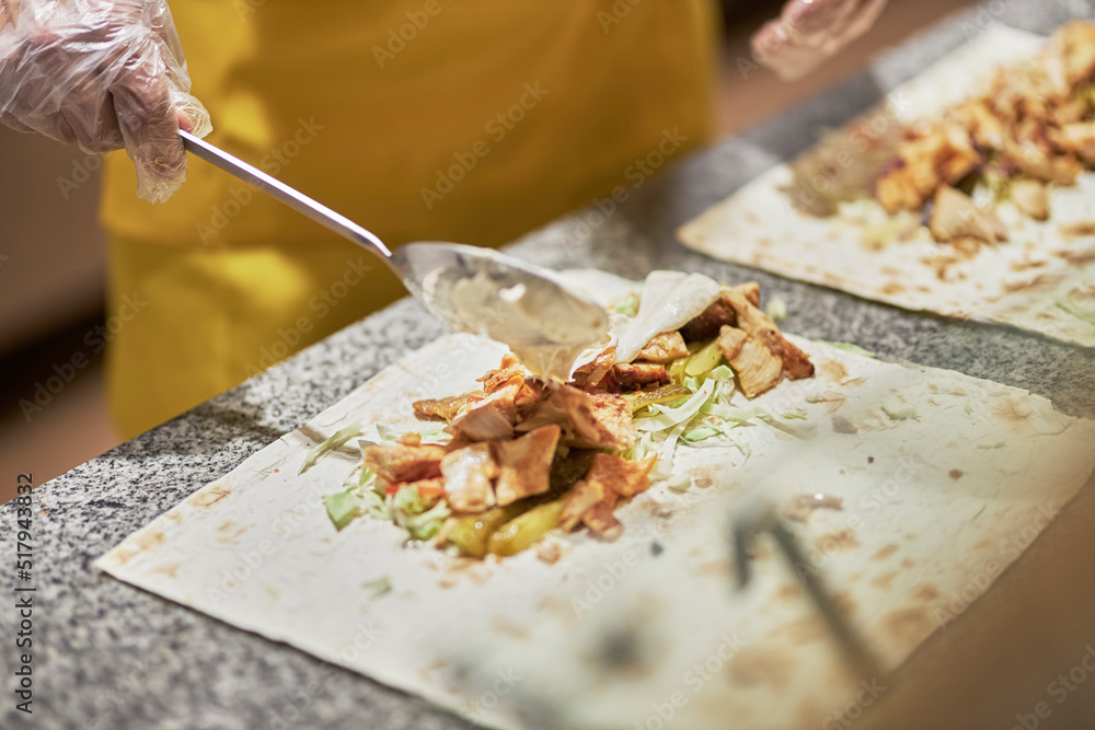 The process of making shawarma. closeup Stock Photo | Adobe Stock