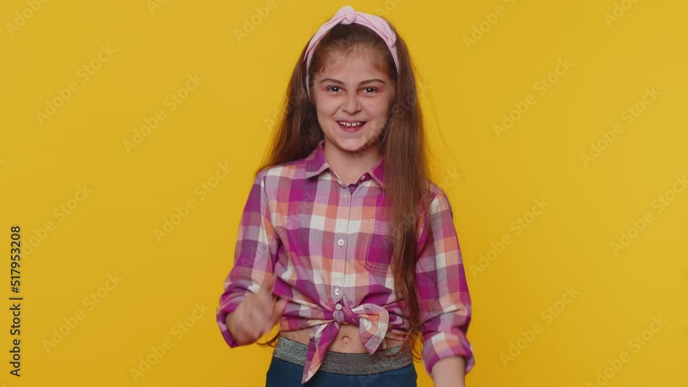 Happy joyful young preteen child girl kid making playful silly facial ...