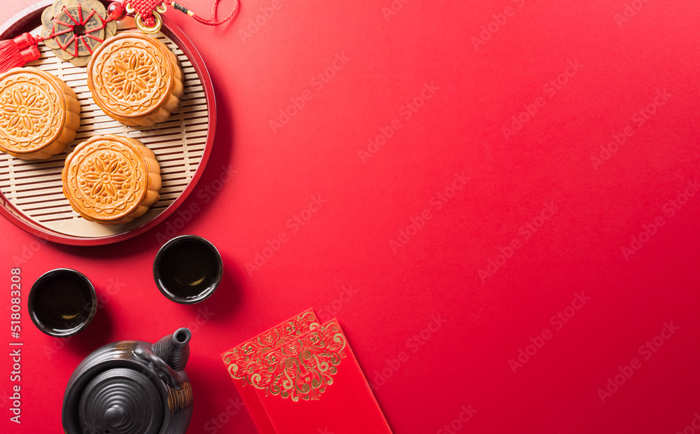 Chinese Mid-Autumn Festival concept made from mooncakes, tea and plum ...