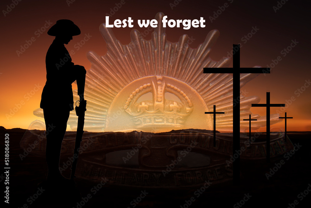 Silhouette of an Australian soldier with arms reversed against a golden ...