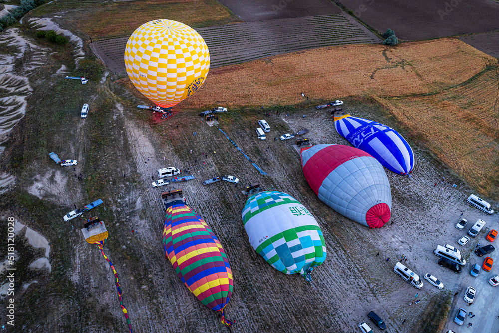 hot air balloons are deflated after the tourist flight. Stock Photo ...