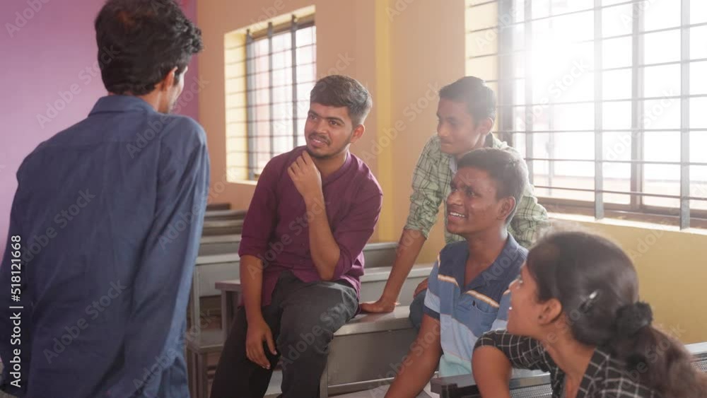 Group od happy smiling college students having chat with each other at ...