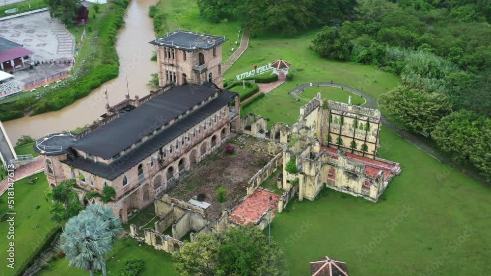 British colonial ruins, old Scottish folly, drone fly around riverside ...
