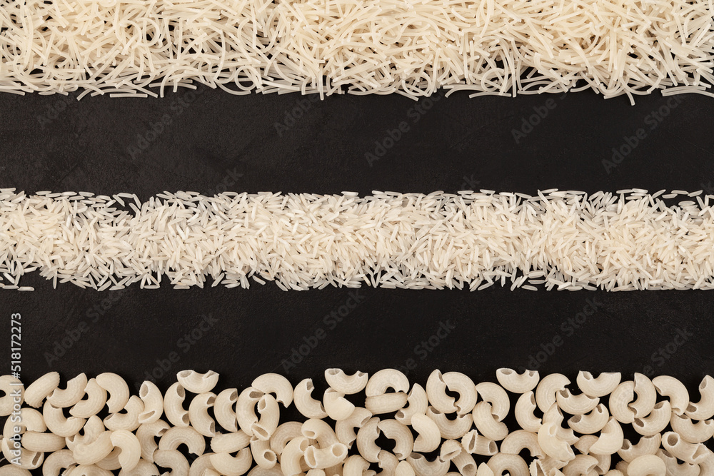 Rice basmati and two types Italian pasta of Rice flour on dark textured ...