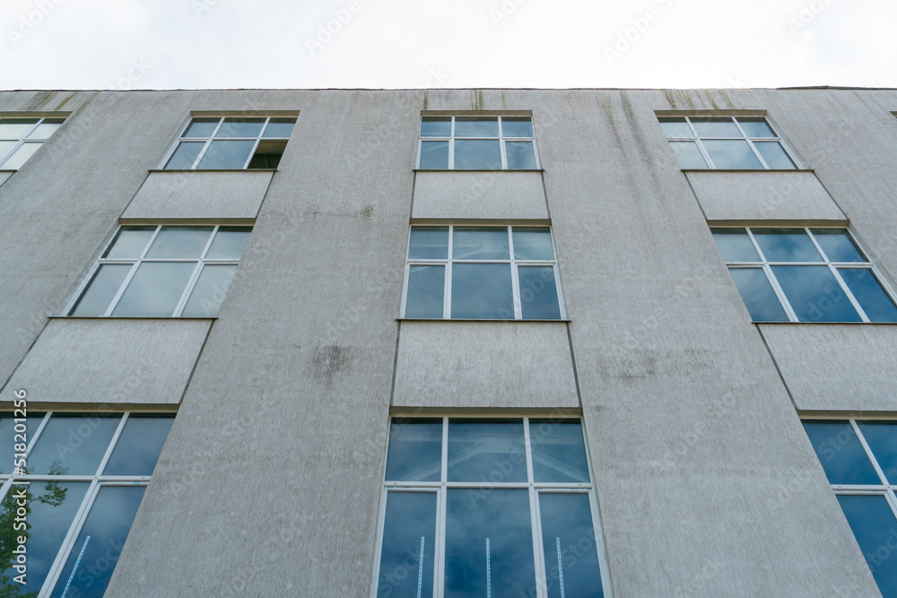 View of the facade of an office building with large Windows. New wide ...