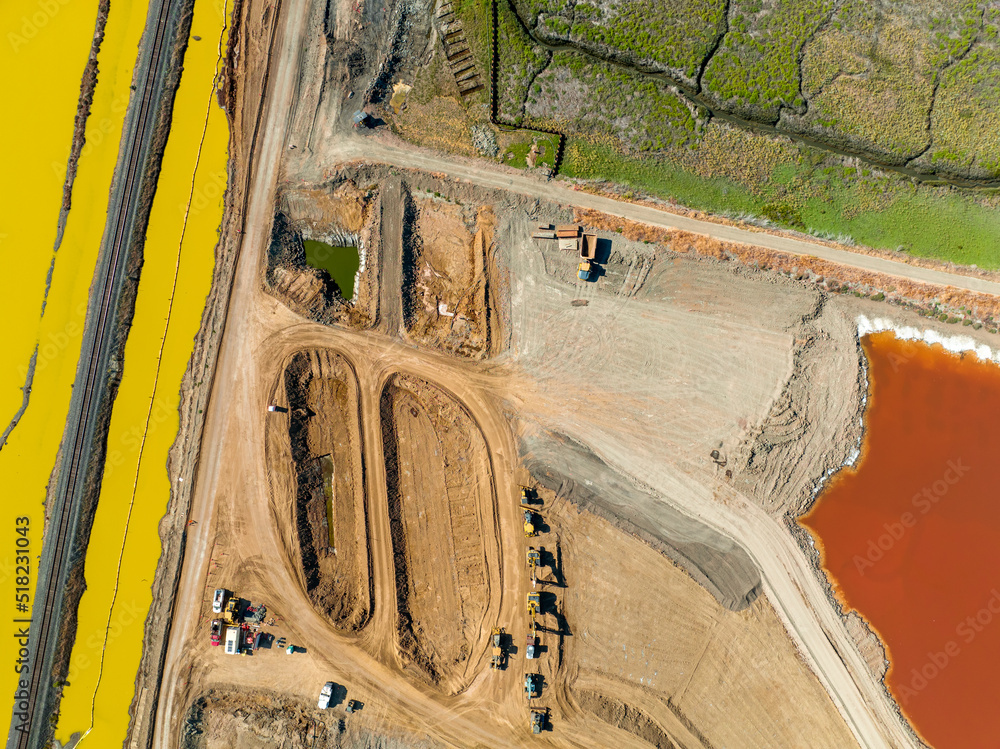 Aerial view of yellow and deep orange salt marsh full of minerals in ...