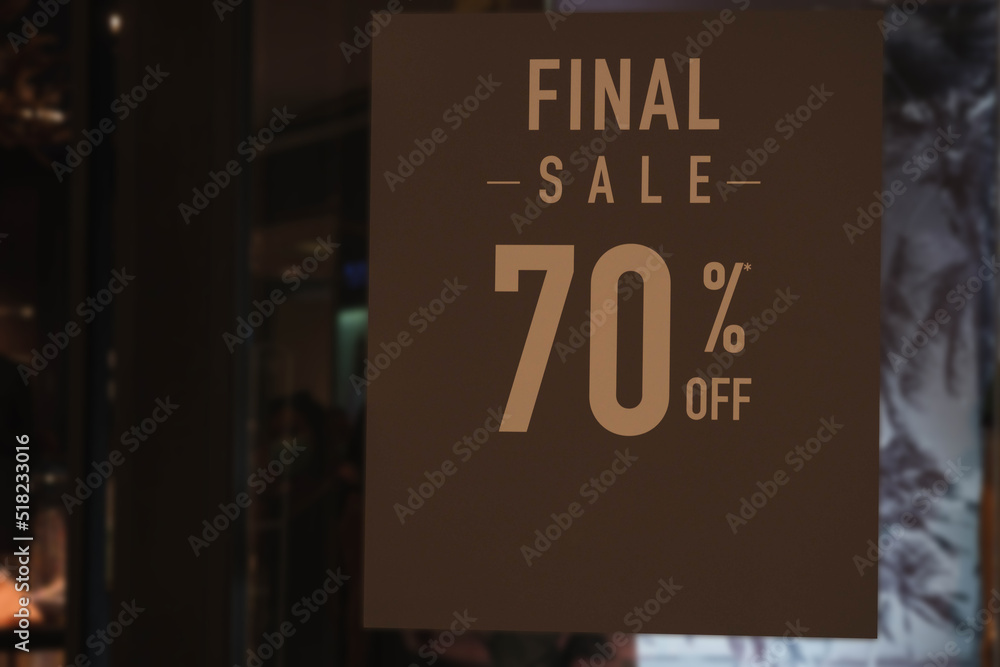 Discount percentage red sign display in fashion department store during ...