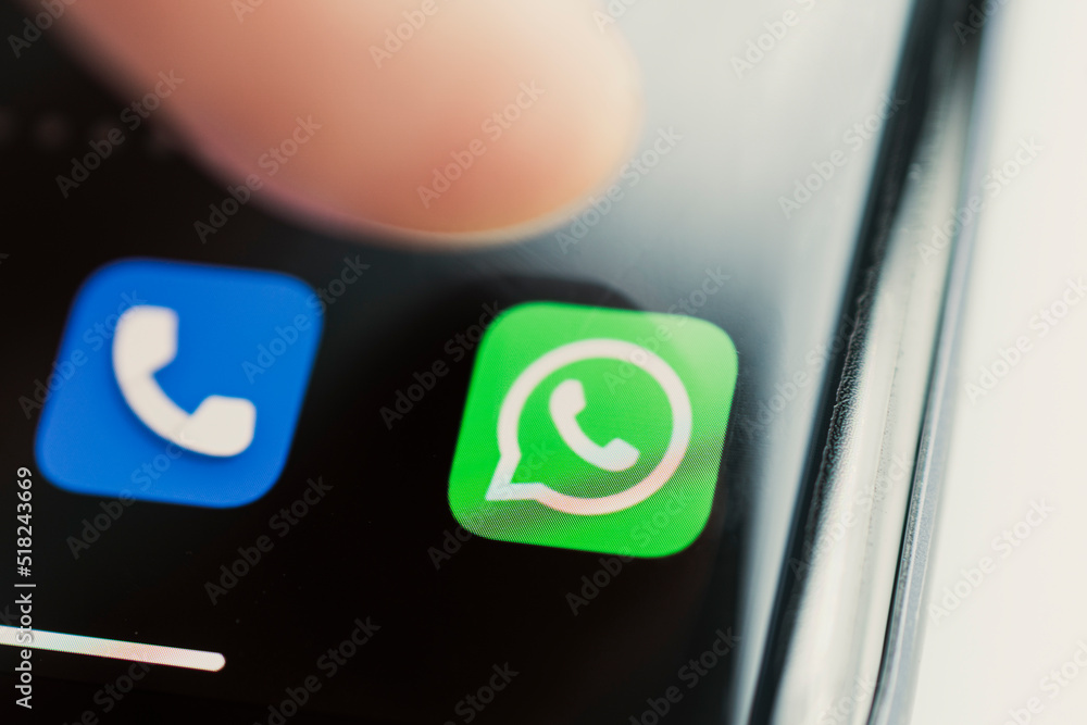 Icon of the whatsapp, app on the screen of a black smartphone. Stock ...