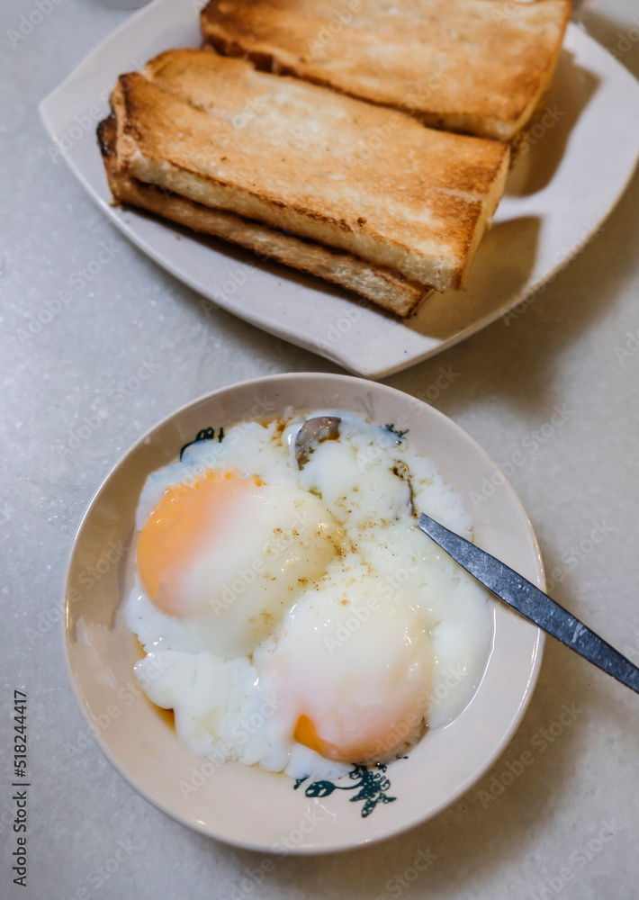 Breakfast in Malaysian Chinatown. Hainanese Breakfast. Toasted bread ...
