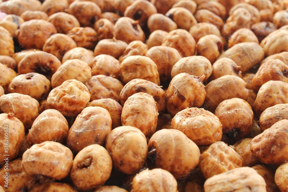 Close-up of chufa, tigernut, earth ground Almond, groundnut, tiger nut ...