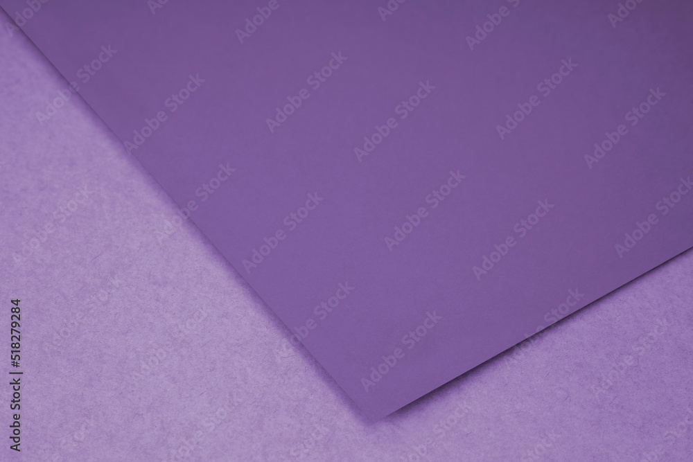 Plain purple paper sheet lying on purple textured Background like an ...