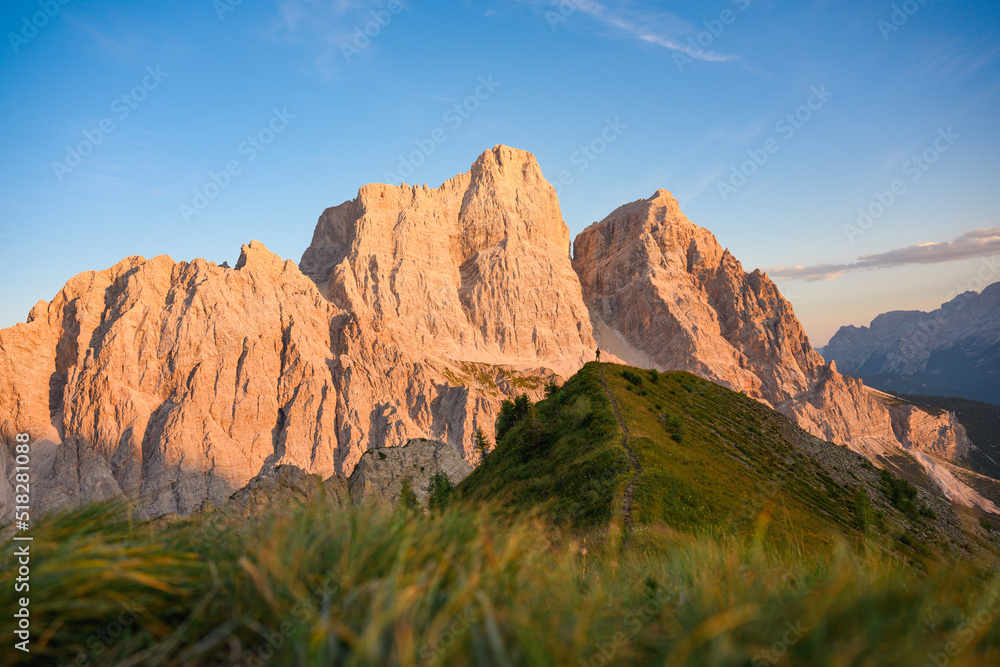 Stunning view of a person enjoying the view of Monte Pelmo from the ...