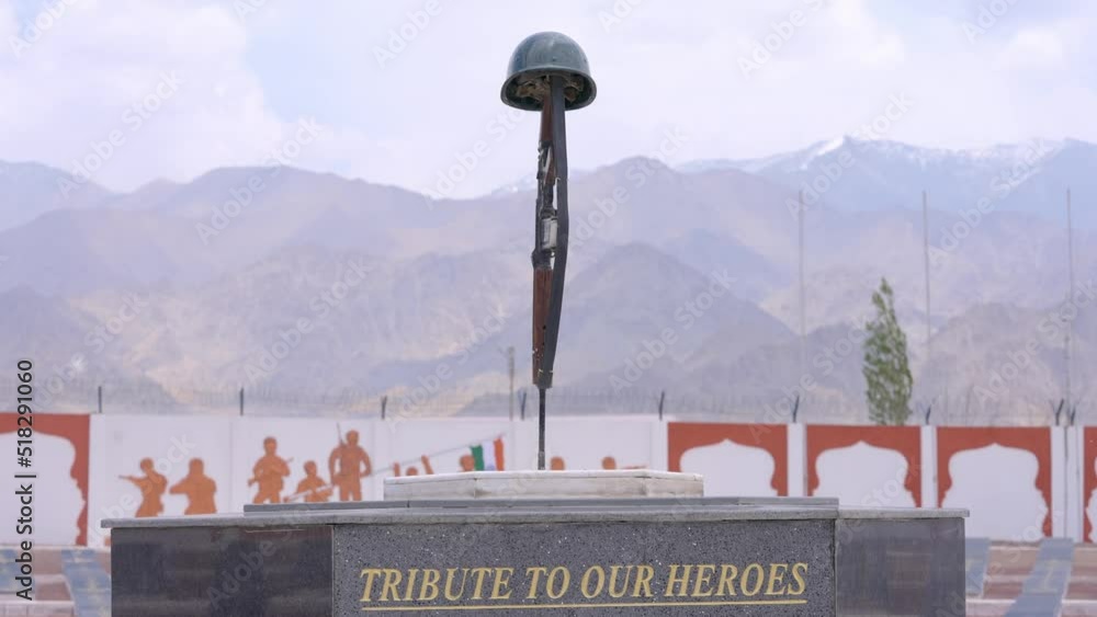 A Helmet And Rifle Stand In Memory Of Brave Soldiers Of Indian Army ...