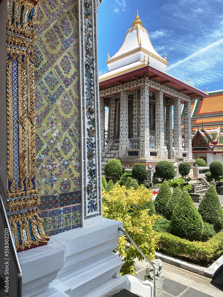 Wat Arun Temple in Bangkok, Thailand with stone pyramid towers, golden ...
