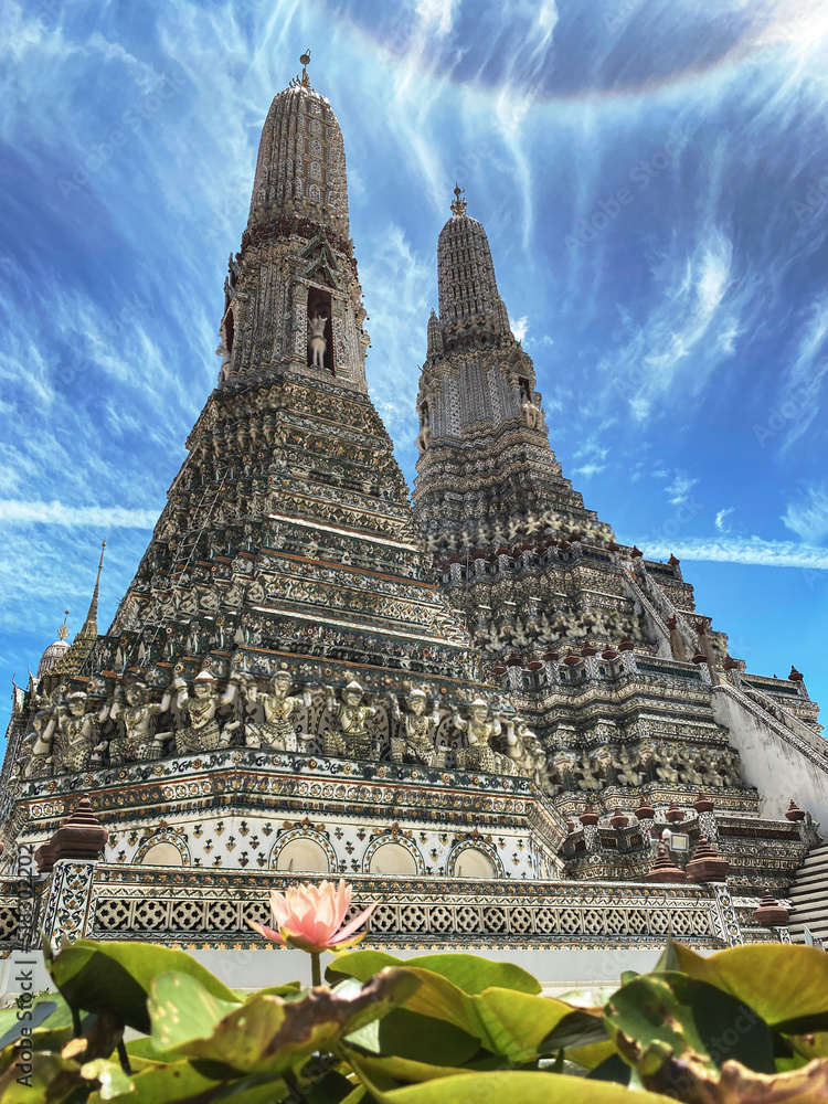 Wat Arun Temple in Bangkok, Thailand with stone pyramid towers, golden ...