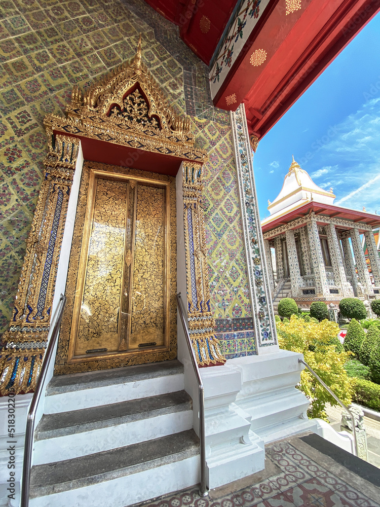 Wat Arun Temple in Bangkok, Thailand with stone pyramid towers, golden ...