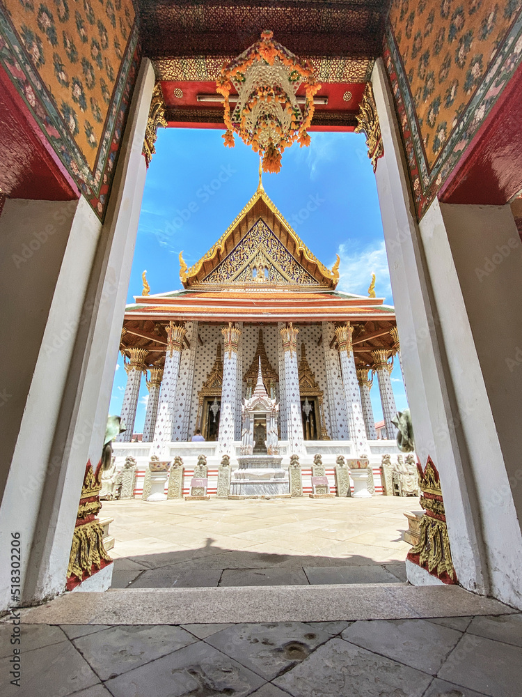Wat Arun Temple in Bangkok, Thailand with stone pyramid towers, golden ...