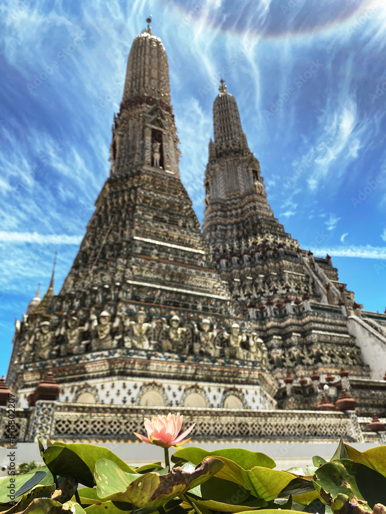 Wat Arun Temple in Bangkok, Thailand with stone pyramid towers, golden ...