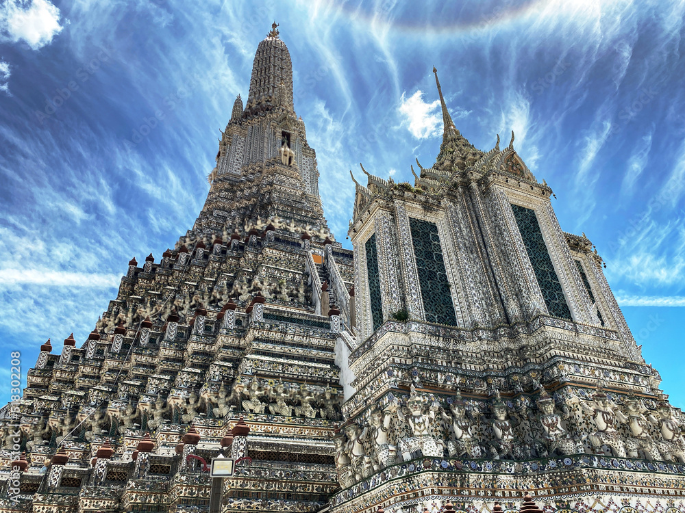 Wat Arun Temple in Bangkok, Thailand with stone pyramid towers, golden ...