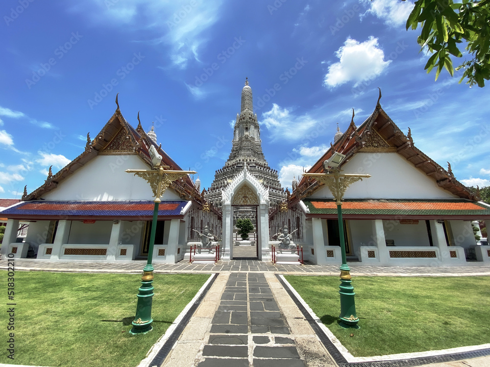 Wat Arun Temple in Bangkok, Thailand with stone pyramid towers, golden ...