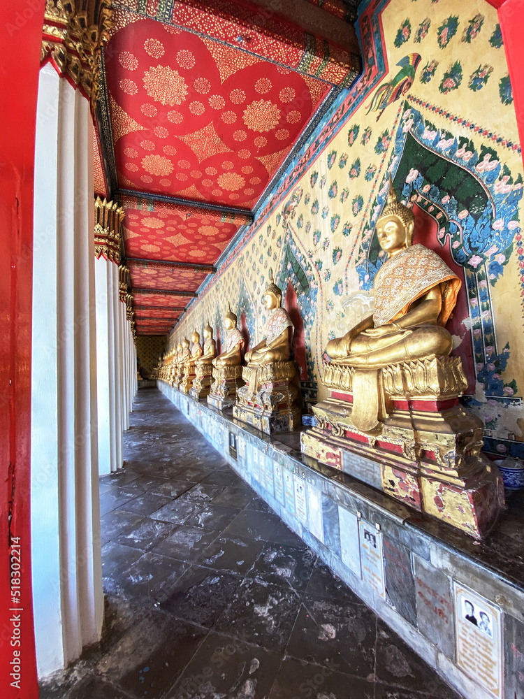 Wat Arun Temple in Bangkok, Thailand with stone pyramid towers, golden ...