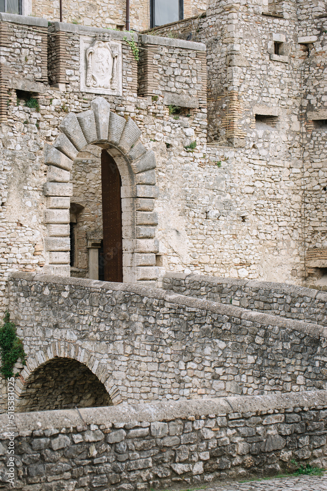 Medieval castle of Orsini Odescalchi in Nerola, Rome close-up. Arched ...