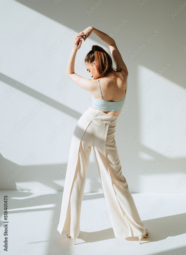 Full body woman portrait pastel color - Sunlight Stock Photo | Adobe Stock