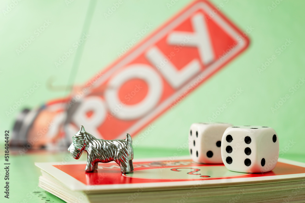 Kaunas, Lithuania - July 2022: close up of monopoly dog, monopoly board ...