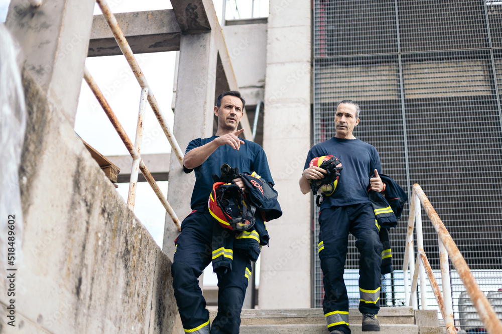 Firefighters responding to an emergency Stock Photo | Adobe Stock
