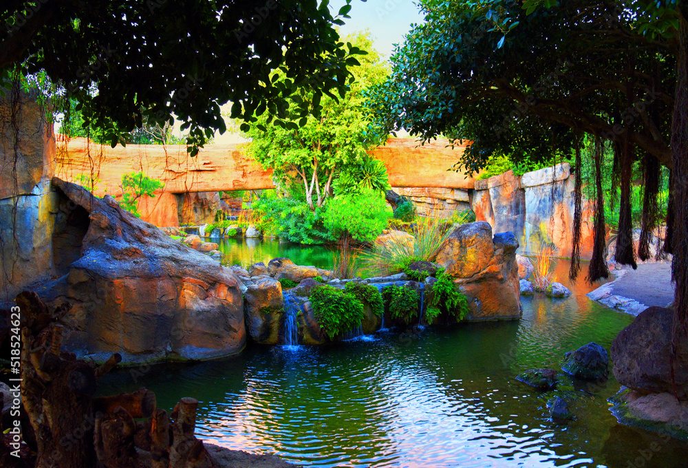 Waterfall in the African savannah. Waterfall from a large stone ...