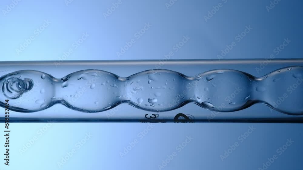 A moment of water flow into a test tube , water experiment and ...