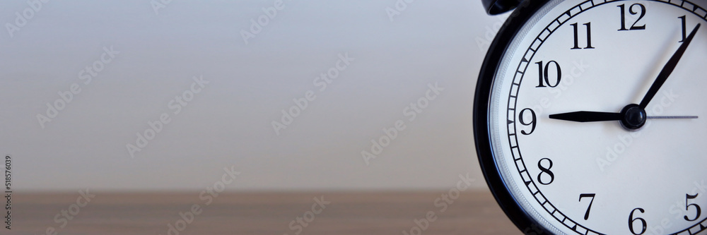 Analog alarm clock pointing at hours, minutes, seconds to display time ...