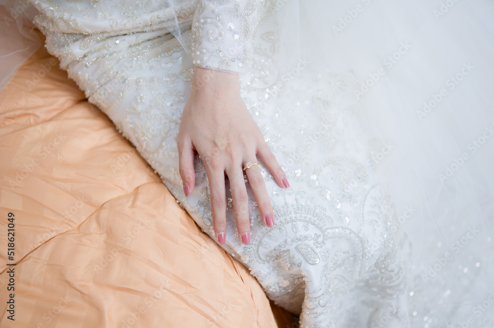 muslim groom in white wedding dress site on chair in wedding ceremony ...