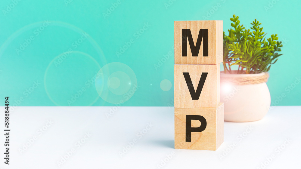 mvp - acronym from wooden blocks with letters Minimum Viable Product ...