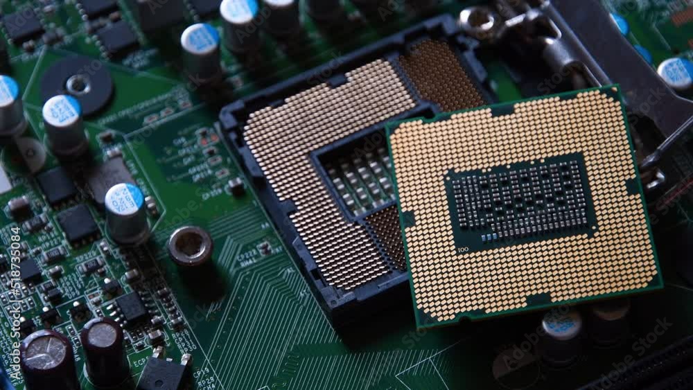 Detail of a CPU Processor over his Socket on a Motherboard. Printed Circuit Board - Computer ...