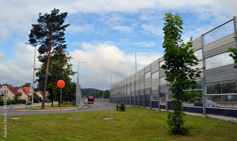 A noise barrier (also called a soundwall, noise wall, sound berm, sound ...