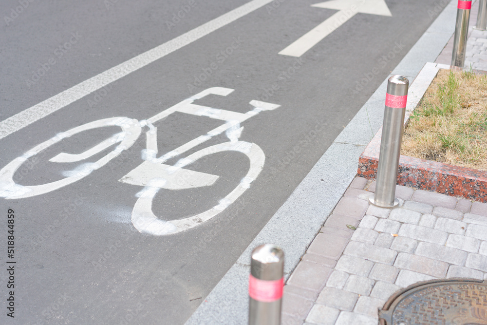 Road sign bicycle path with the sign is drawn on the asphalt. Sidewalk ...
