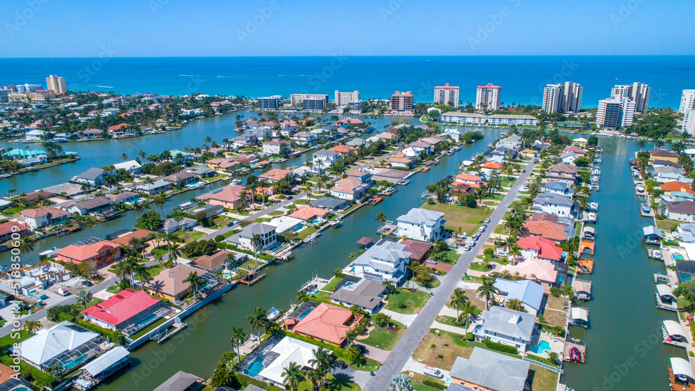 Aerial View of Homes on Canals and Waterways in Naples, Florida with ...