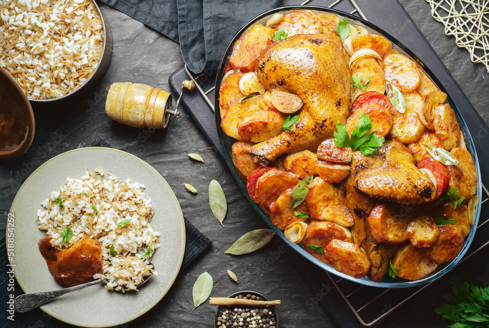 Arabic cuisine; Egyptian traditional dish "Baked potatoes with roasted ...