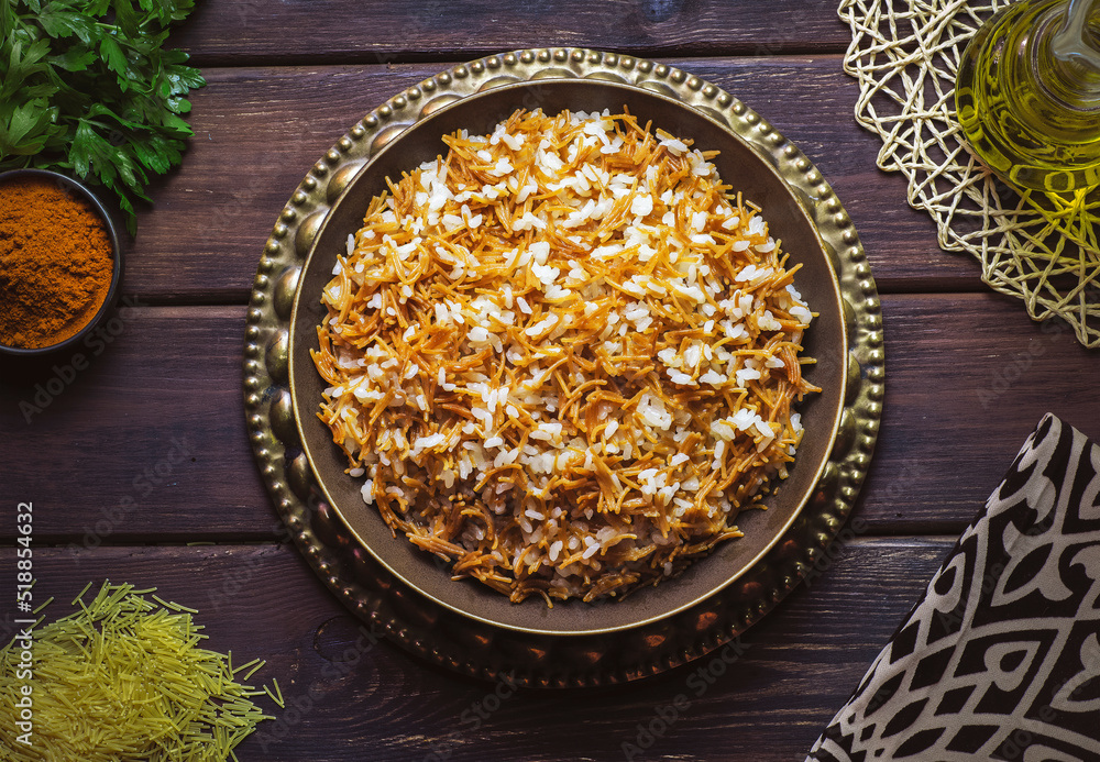 Arabic cuisine; Egyptian oriental dish "Rice with vermicelli". Top view ...