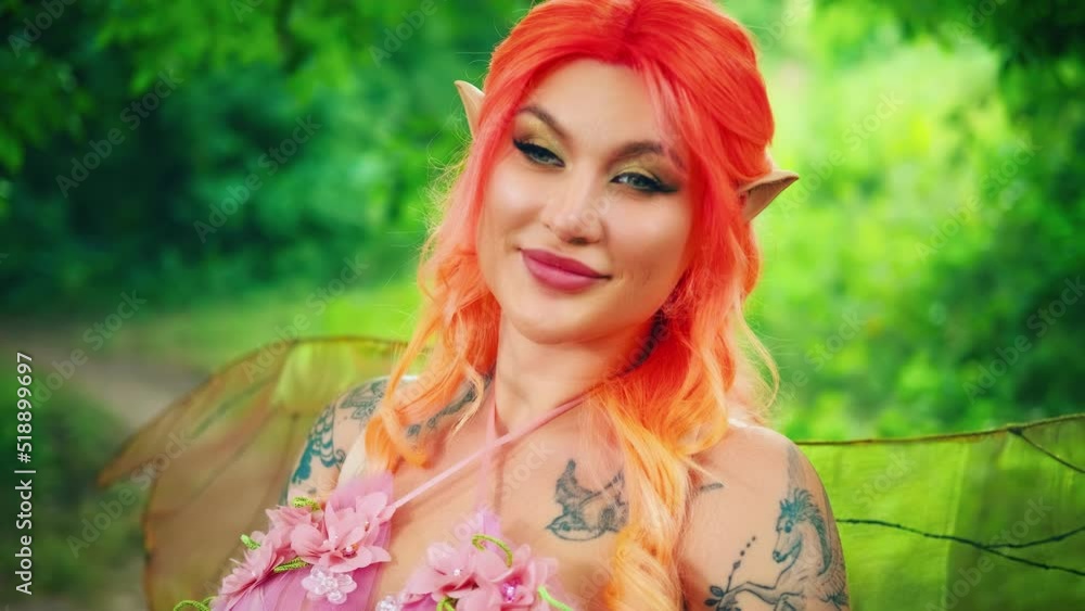 Portrait happy fantasy woman faerie with butterfly wings red orange ...