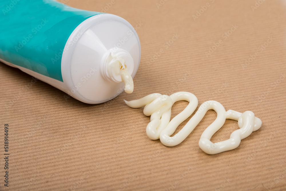 Pharmaceutical medicine or healing topical application ointment concept ...