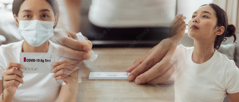 Woman self test for COVID-19 home test kit. Asian woman using ...