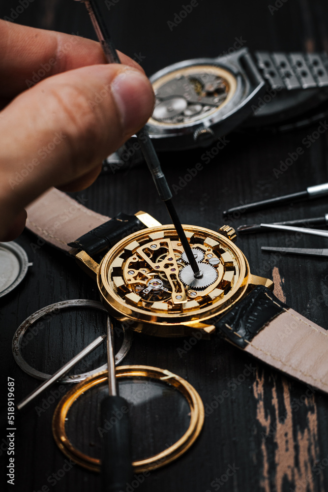 Mechanical watch repair. Watchmaker is repairing the mechanical watches ...