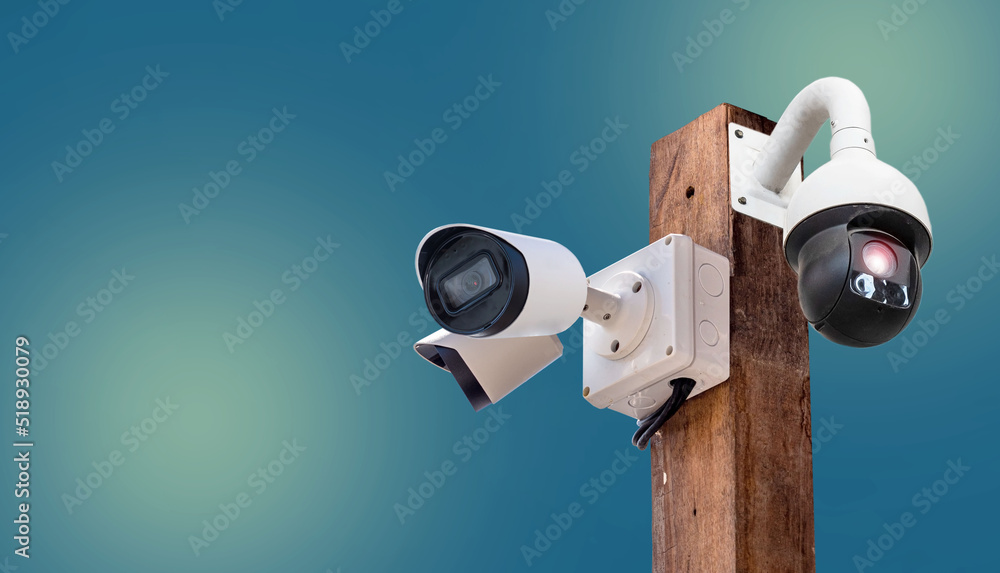 Multi-angle CCTV system on wooden poles, background blast cipping path ...