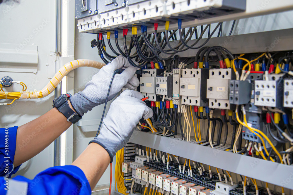 Electricity and electrical maintenance service, Engineer hand holding ...
