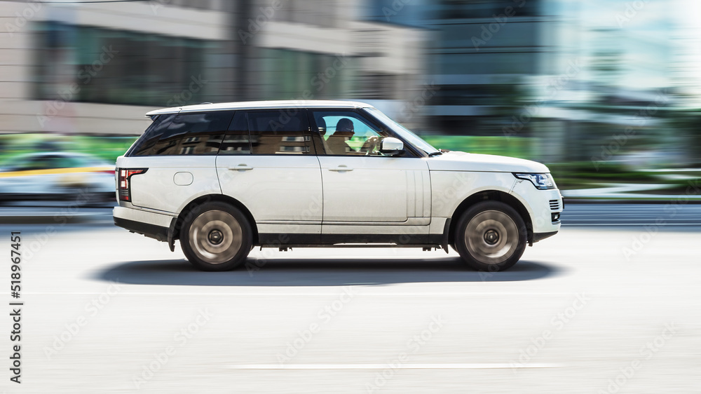 car Range Rover L405 in motion, side view. Sport SUV white colour ...