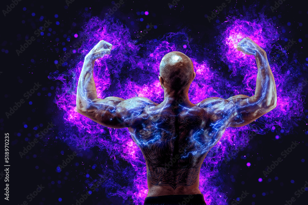 Back view of a muscular body builder flexing his muscles with energy ...
