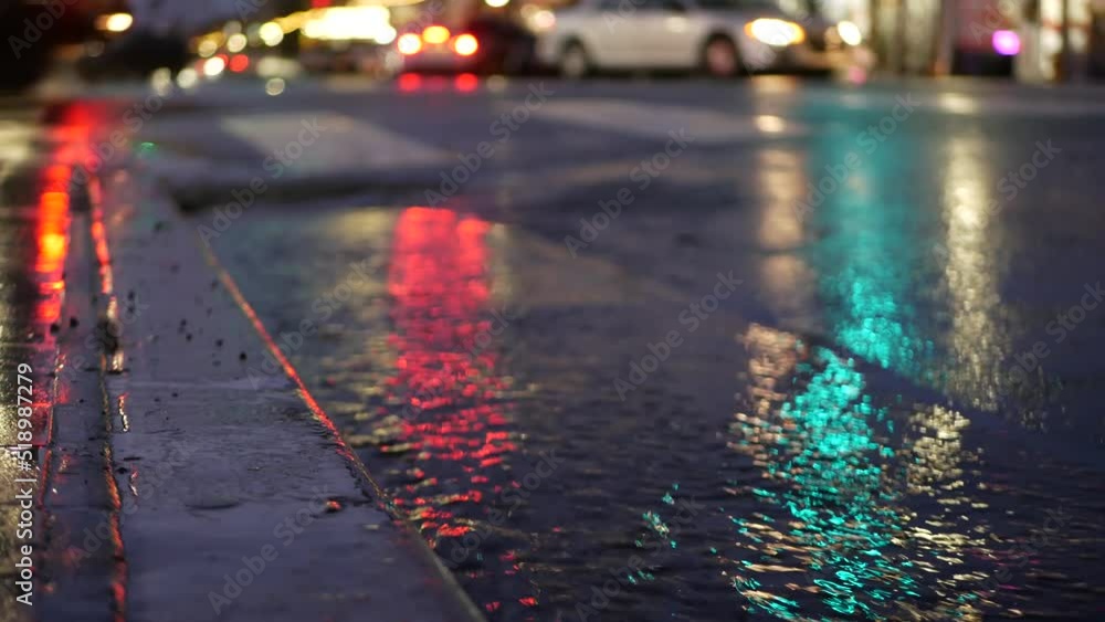 Cars lights reflection on road in rainy weather. Rain drops on wet ...